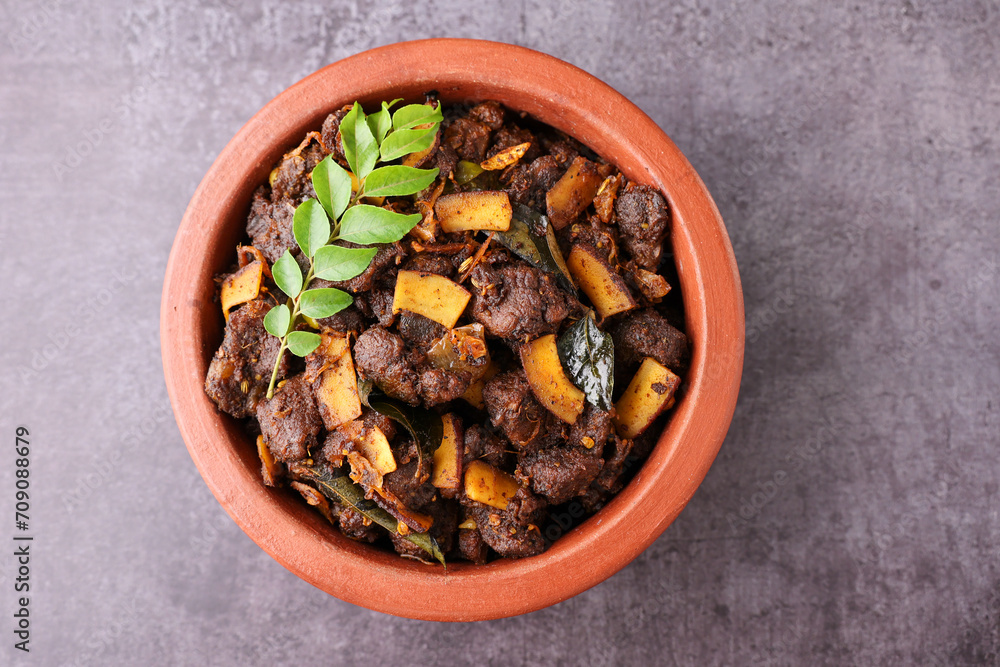 Spicy red beef fry curry and brown rice South Indian dish Kerala, India ...