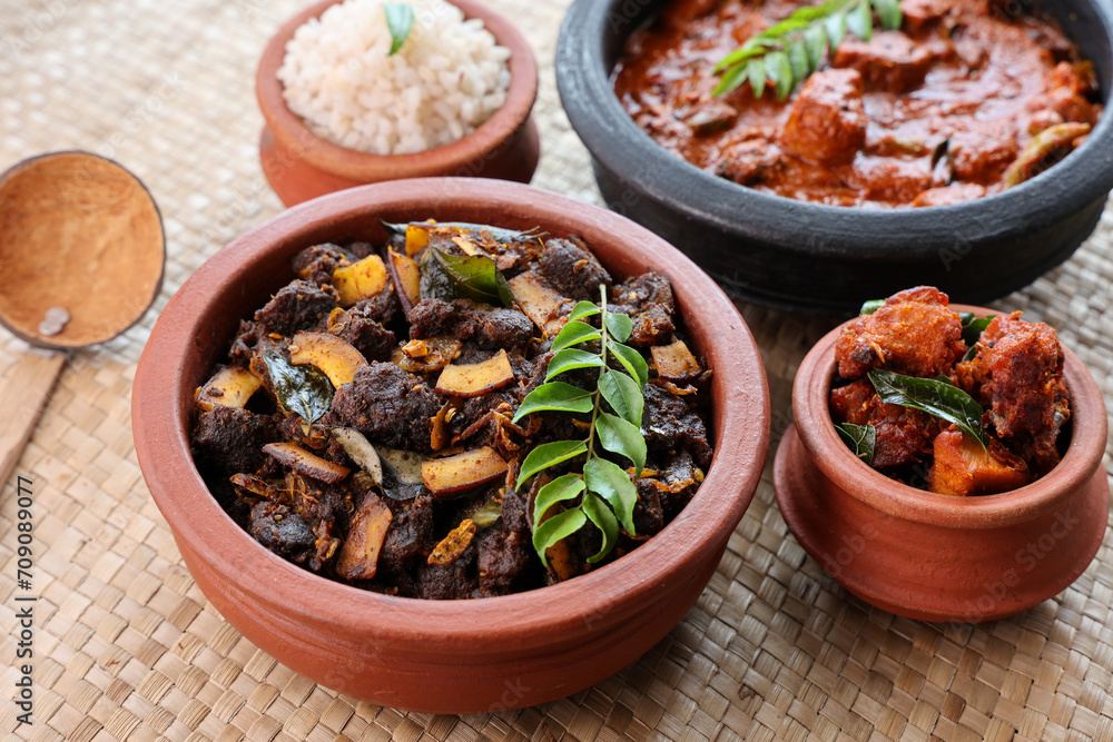 Spicy red beef fry curry and brown rice South Indian dish Kerala, India ...