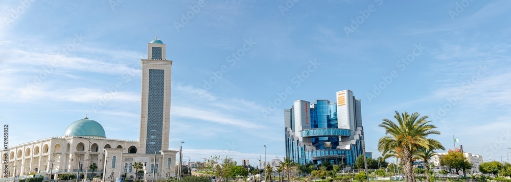 The Ibn Badis mosque in Oran. Domes and minaret in turquoise blue color ...