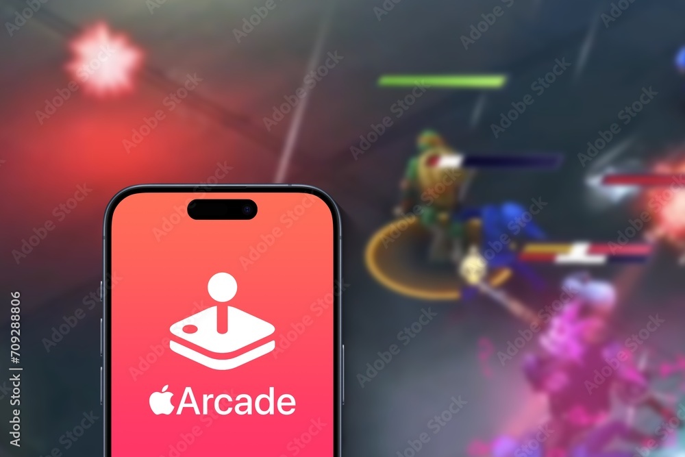 Apple Arcade Logo shown on modern iPhone 15 Pro with a game of the ...