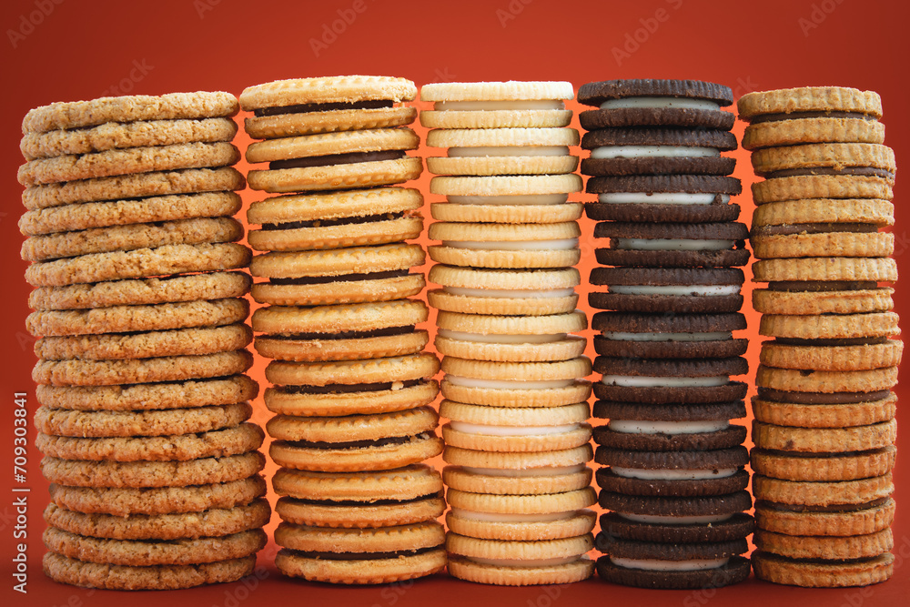 Biscuits of different colors photographed on top of each other with ...