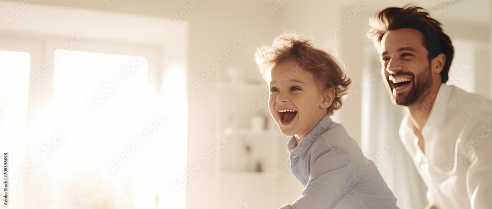 Happy father and son having fun at home, panoramic banner. Active ...