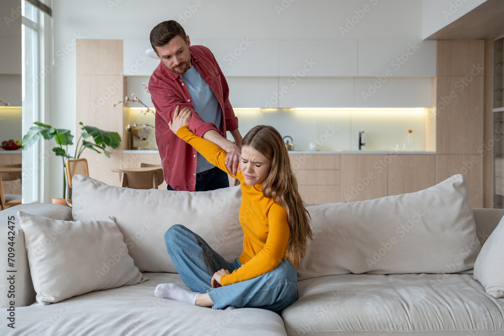 Tense moment married couple as engage in heated argument with faces ...