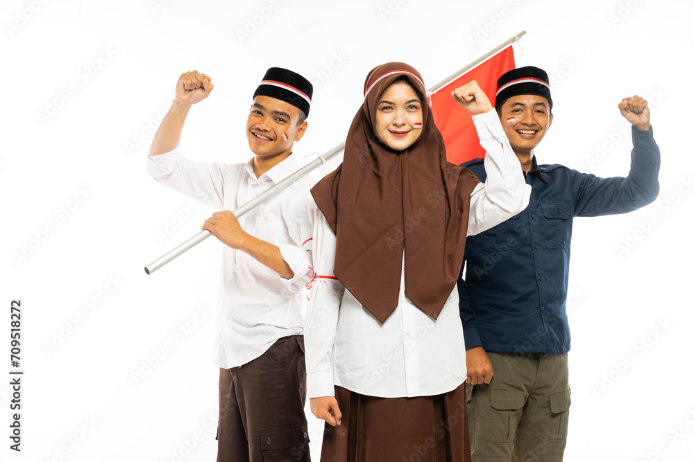 three islamic student with the ribbon at their head standing and ...
