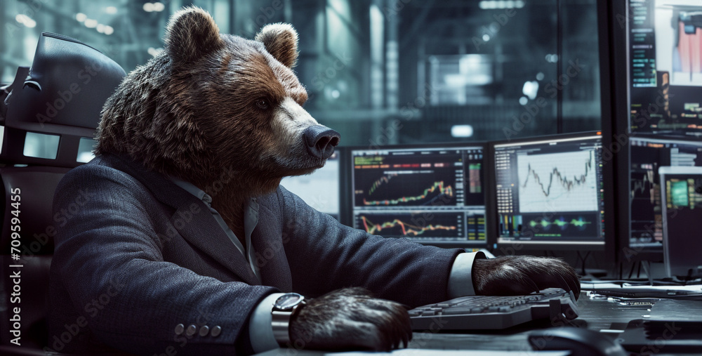 Hacker in a business suit with a bear head on the background of stock ...