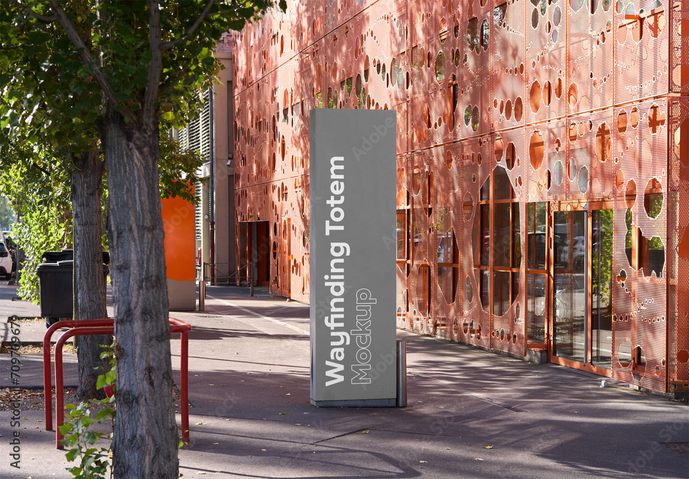 Mockup of customizable freestanding sign by tree Stock Template | Adobe ...