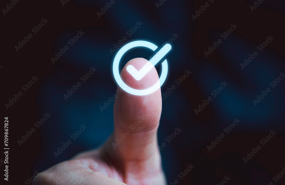Closeup of hand thumb up with virtual correct sign or tick mark for ...
