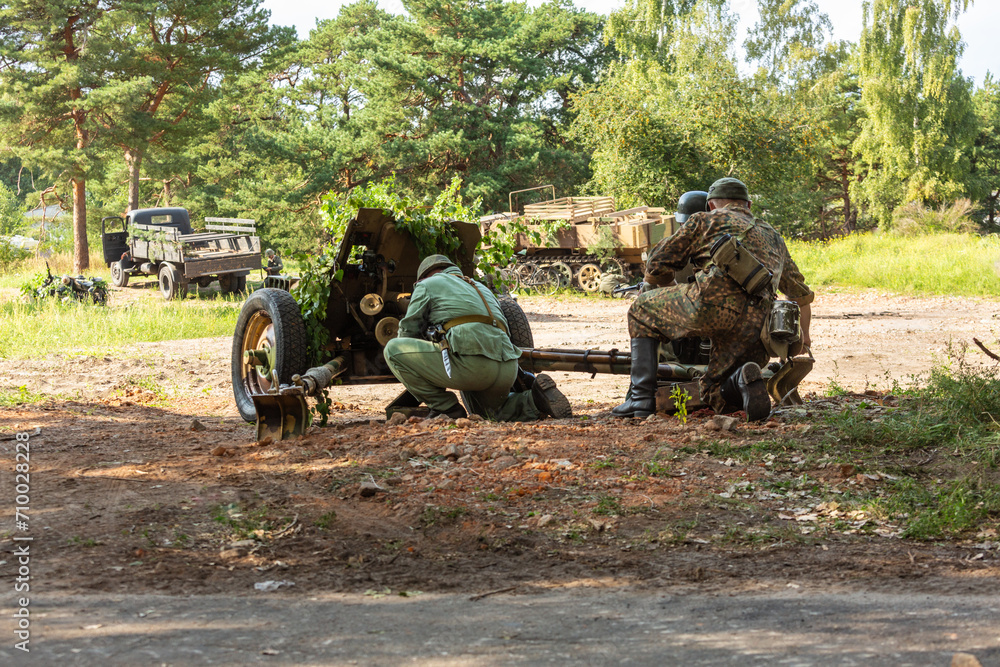 Reconstruction of battle from the Second World War. The crew of a ...