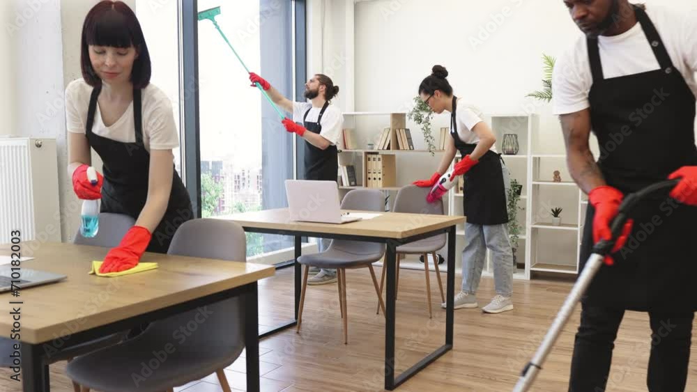 Vidéo Stock Focus on bearded Caucasian worker in a black apron and red ...