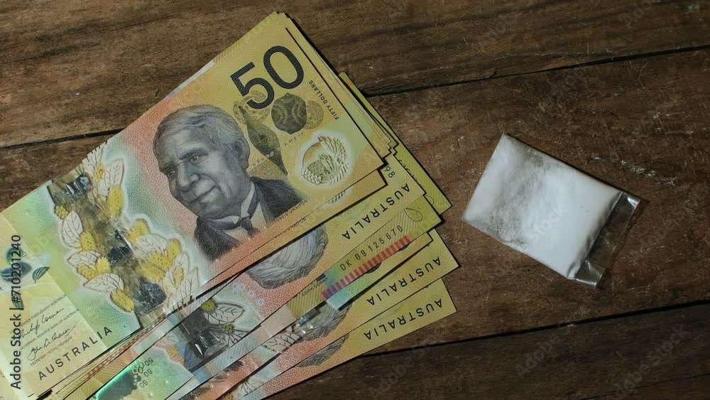 Drug deal mockup Australian dollars single plastic bag of cocaine ...