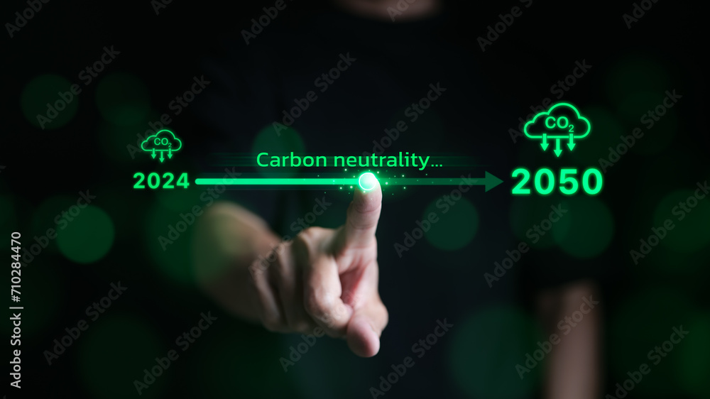 Carbon neutrality concept. Hand touching increasing arrow with carbon ...