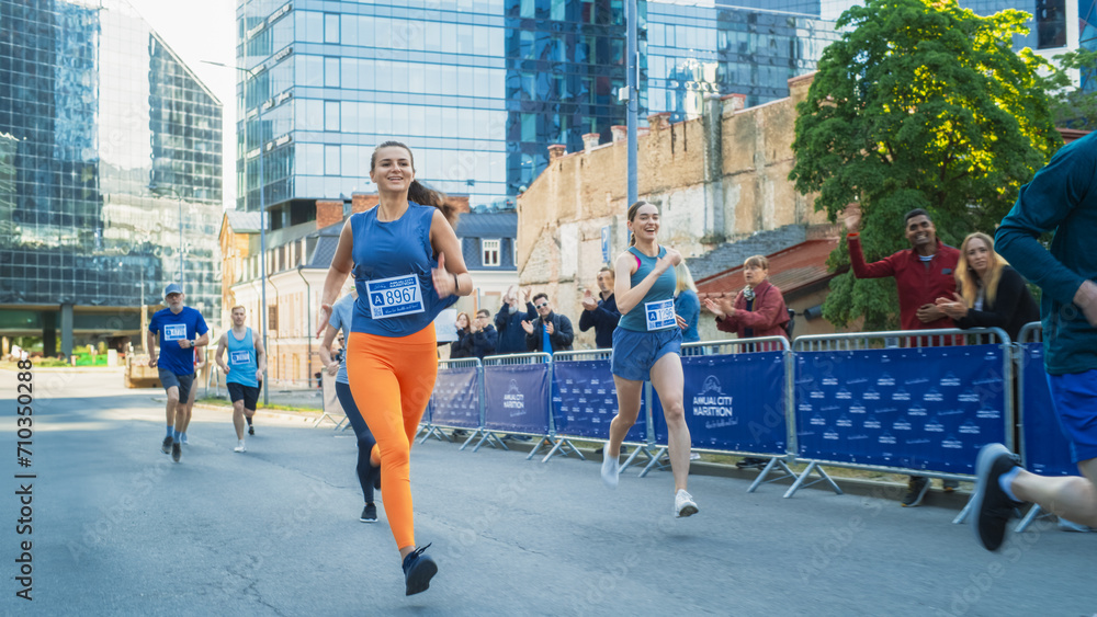 Diverse Group of People Running a Marathon in a City During the Day ...