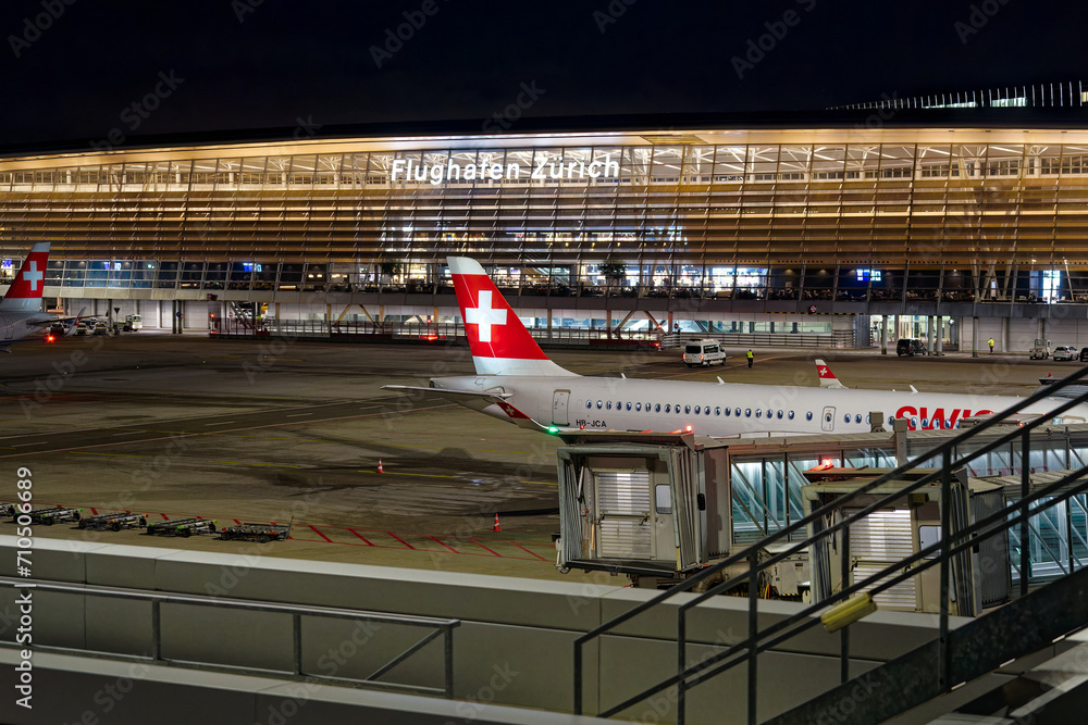 Scenic view of glass facade of Airside Center with lettering and Swiss ...