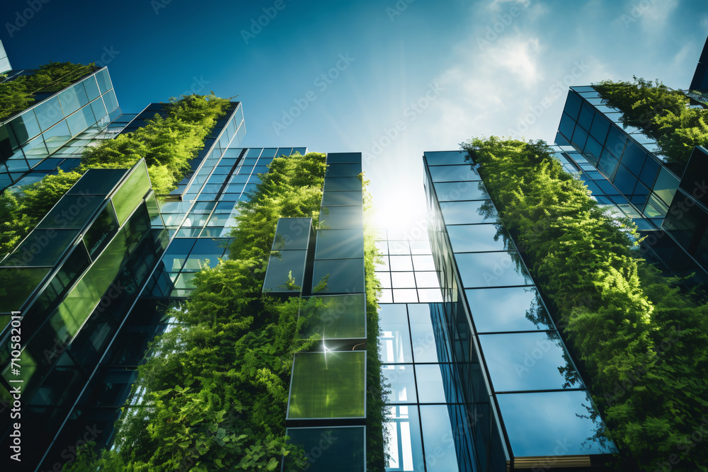 Eco-friendly building in the modern city. Sustainable glass office ...
