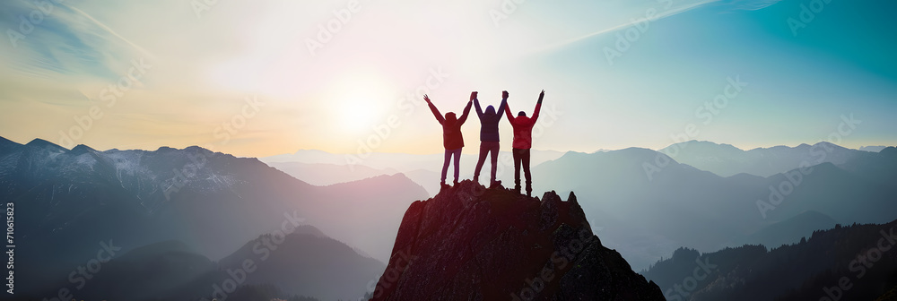 Together overcoming obstacles with three people holding hands up in the ...