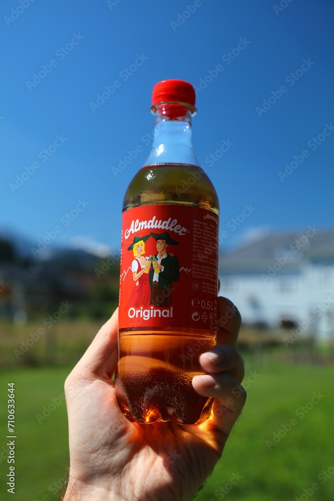 CARINTHIA, AUSTRIA - AUGUST 9, 2022: Almdudler carbonated soft drink in ...
