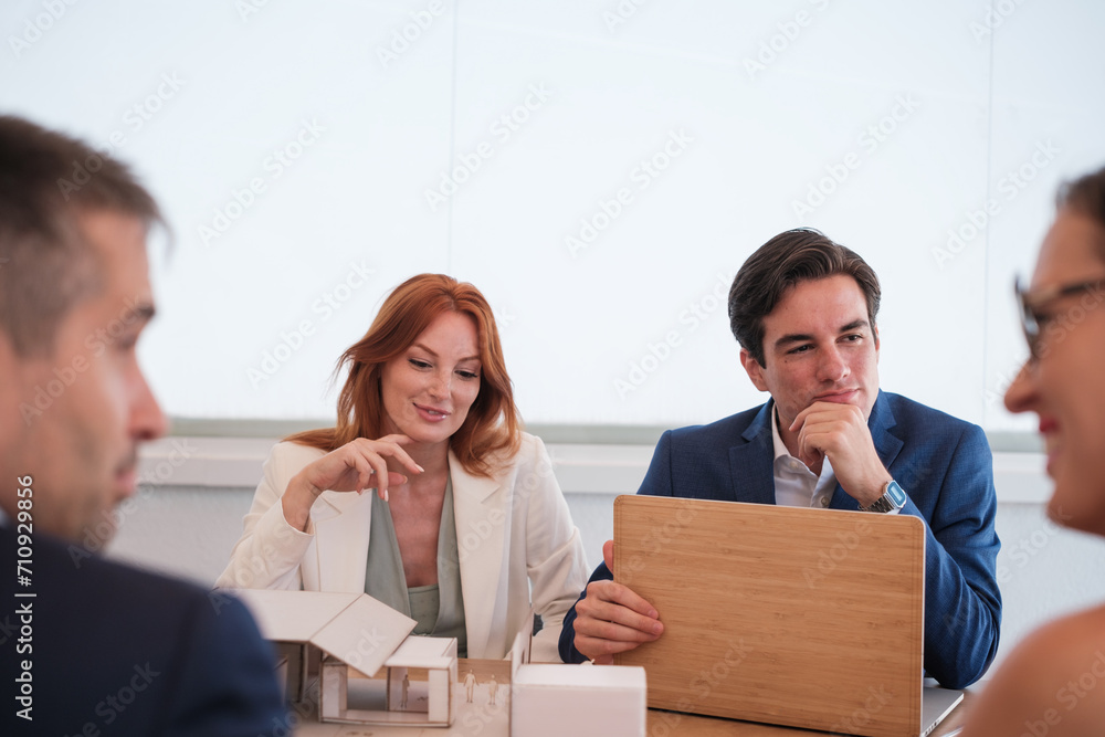 Technical group gathered at the meeting table to modify business errors ...