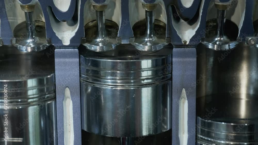 Close up showing work of pistons and structure of car engine inside ...