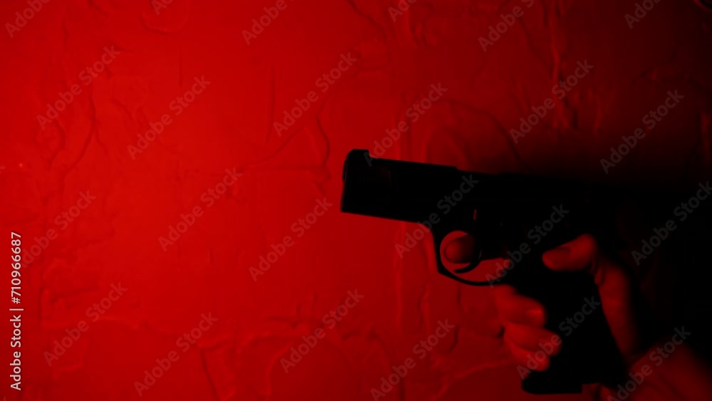 4K hand up holding gun. pistol hand close up. slow motion pistol gun ...
