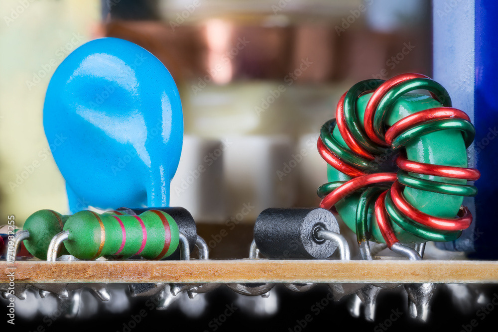 Closeup of toroid electronic coil with ferrite core and copper wire on ...