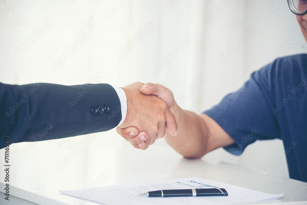Close up hands Team Business Partners shaking hands together to ...
