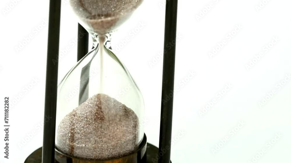 Vídeo do Stock: Pouring vintage hourglass on white Background. sand ...