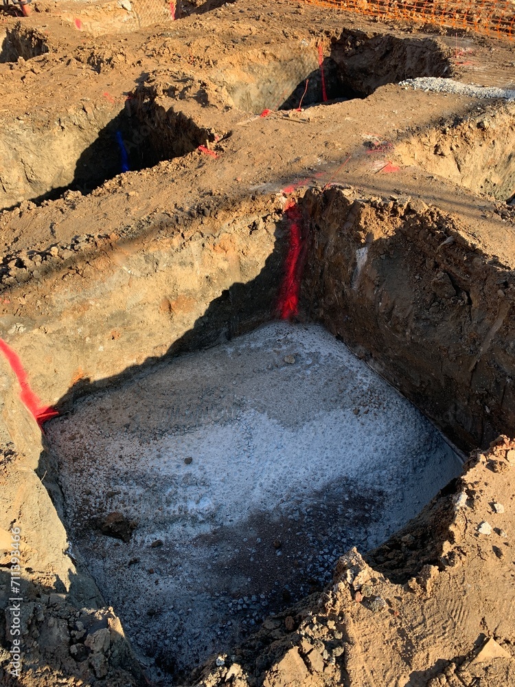 Vertical shot of a isolated concrete footings for new buildings under ...