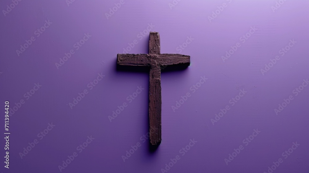 Minimalist Ash Wednesday concept with a simple ash cross on a purple ...