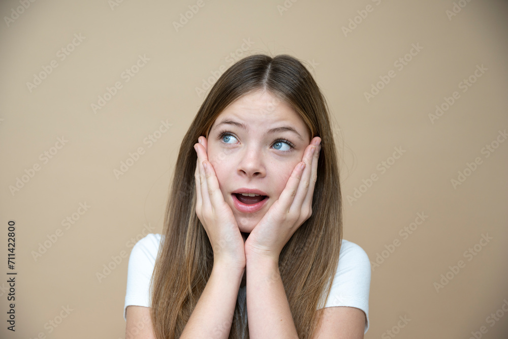 beautiful, cool, cute tween, teenager girl with long hair is posing in ...