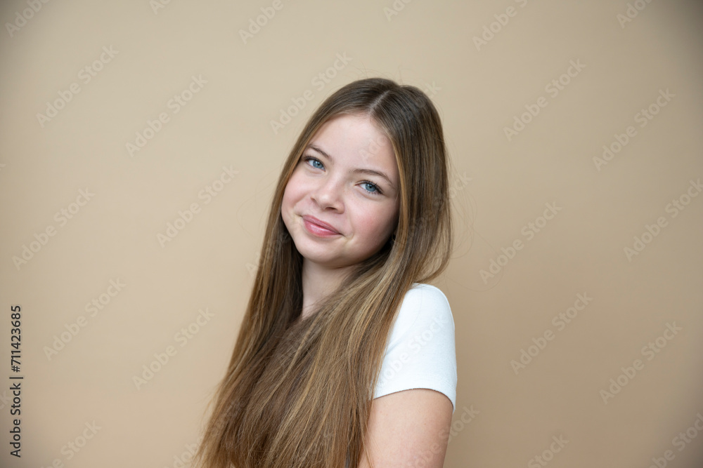 beautiful, cool, cute tween, teenager girl with long hair is posing in ...