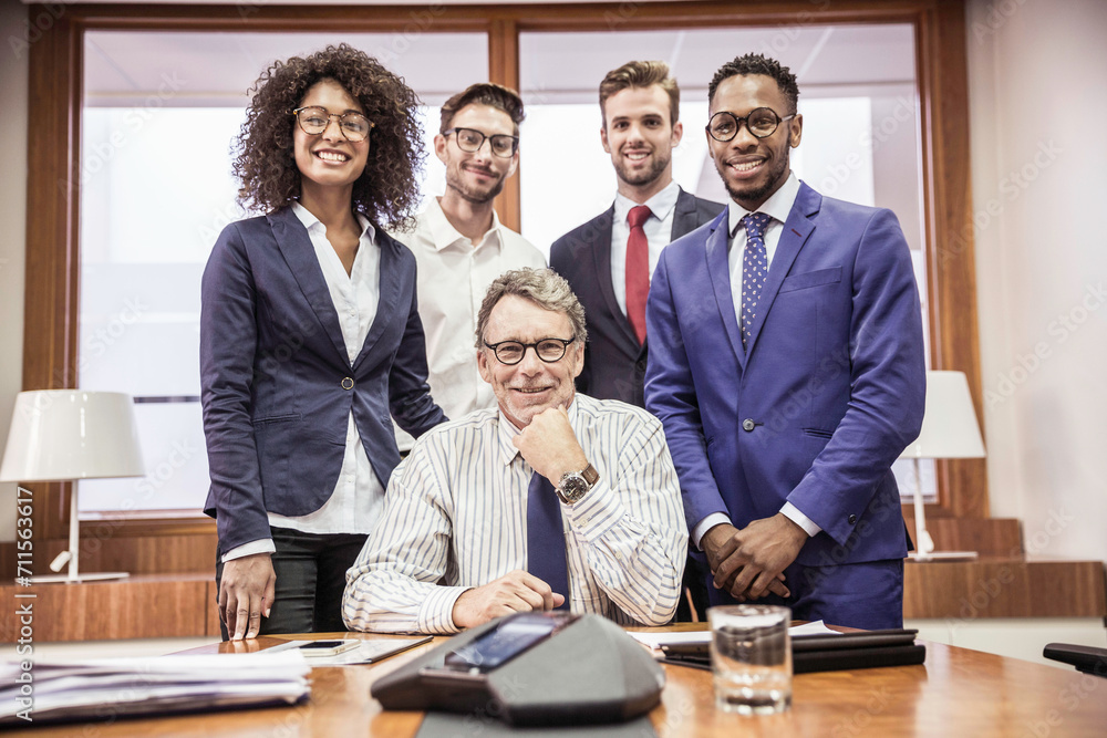 Group picture of mixed racial colleagues in conference room smiling in ...