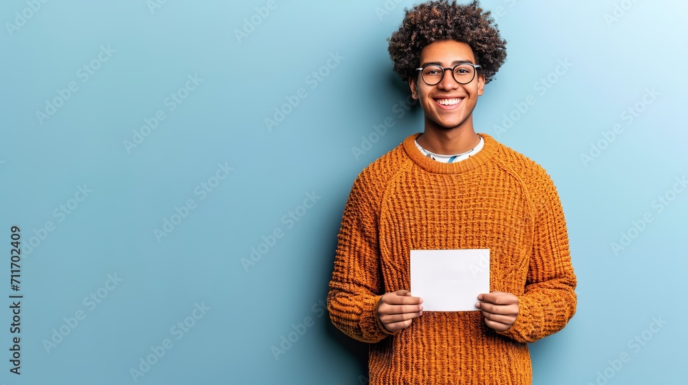 Handsome african american man holding blank placard for text and ads on ... Handsome african american man holding blank placard for text and ads on ...