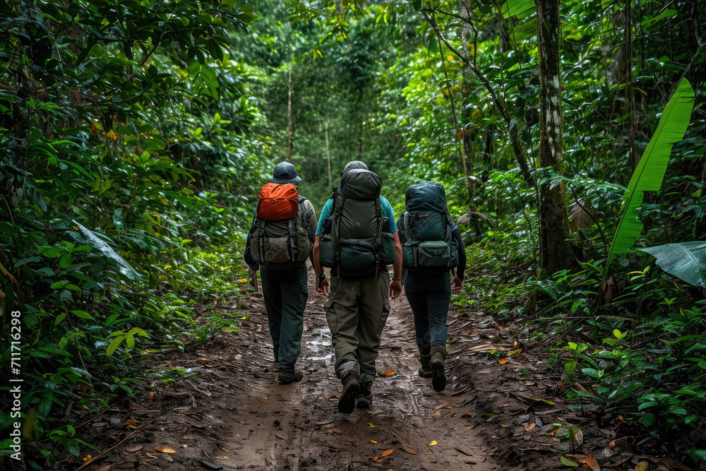 Rainforest Exploration: A Group of Trekkers Walking on Amazon ...