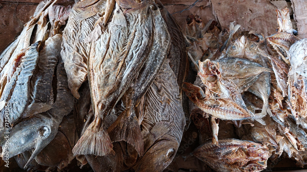 Dried fish called bulad or daing displayed at a local market, one of ...
