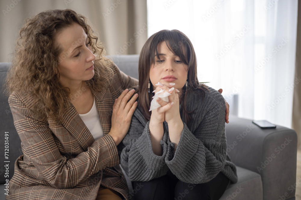 Female psychologist calm down woman patient with sad mental disorder ...
