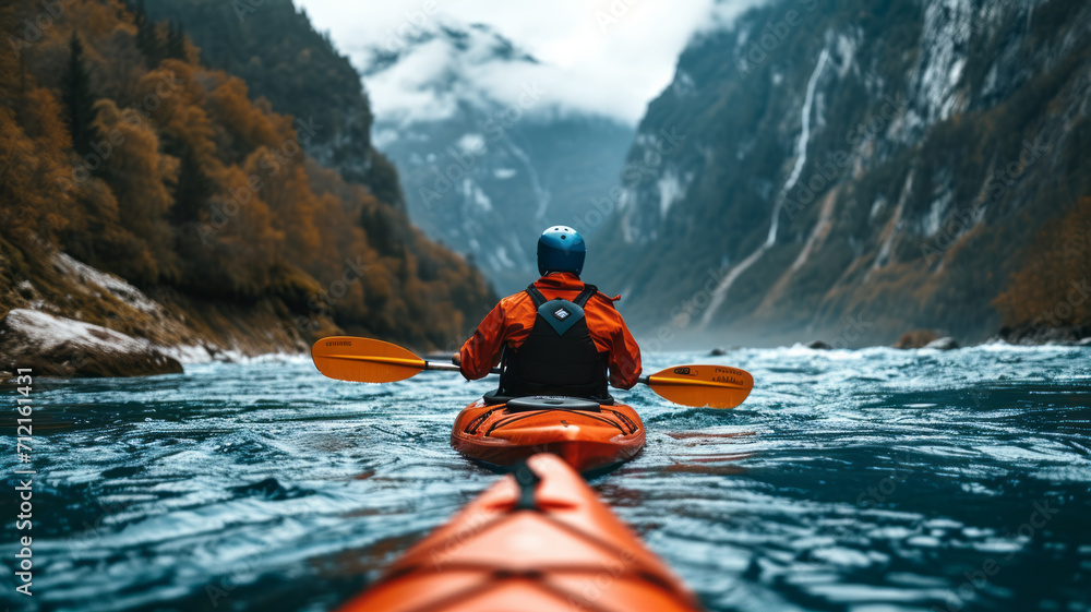 kayaker with whitewater kayaking, down a white water rapid river in the ...