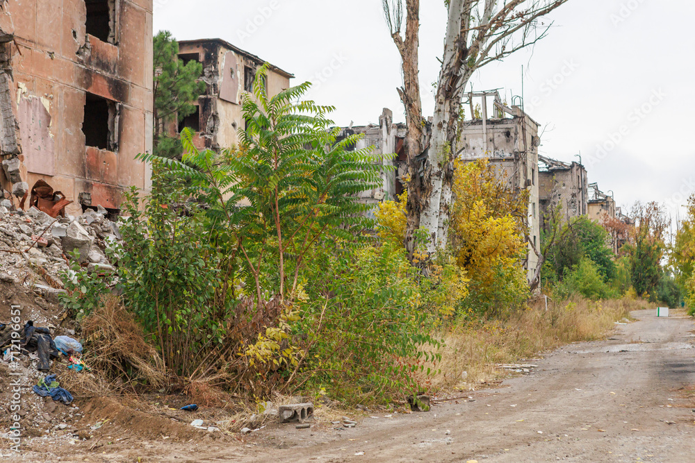 Destroyed and abandoned residental building during war in Ukraine. Stock Photo | Adobe Stock