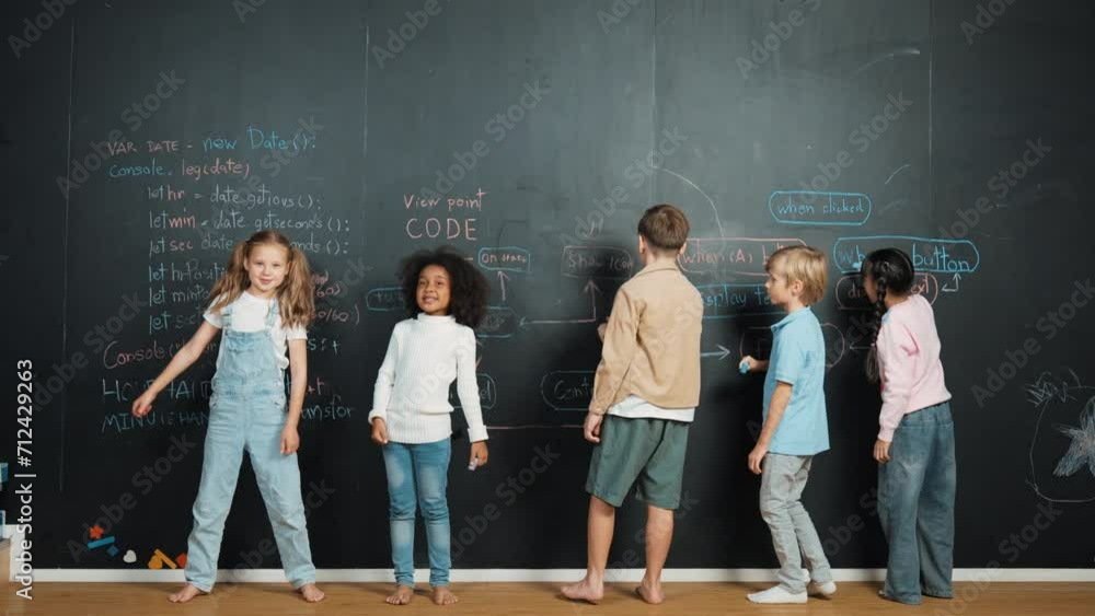 Diverse student writing engineering code or prompt at blackboard in ...