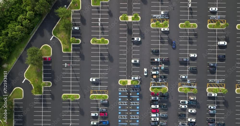 Large parking lot with many parked cars. Big carpark at supercenter ...