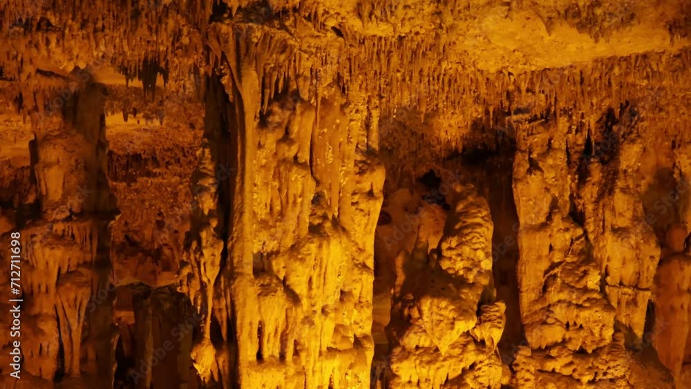 Explore an underground cave with vibrant stalagmites. Unique cave ...