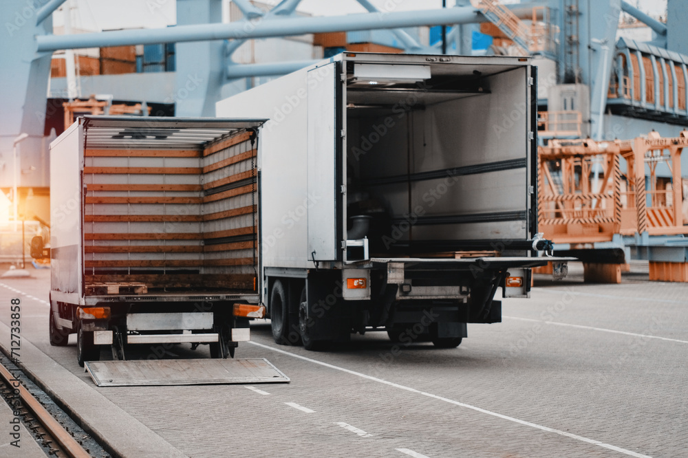 Cargo Trucks With Different Capacity In The Trade Port. Heavy-Duty ...