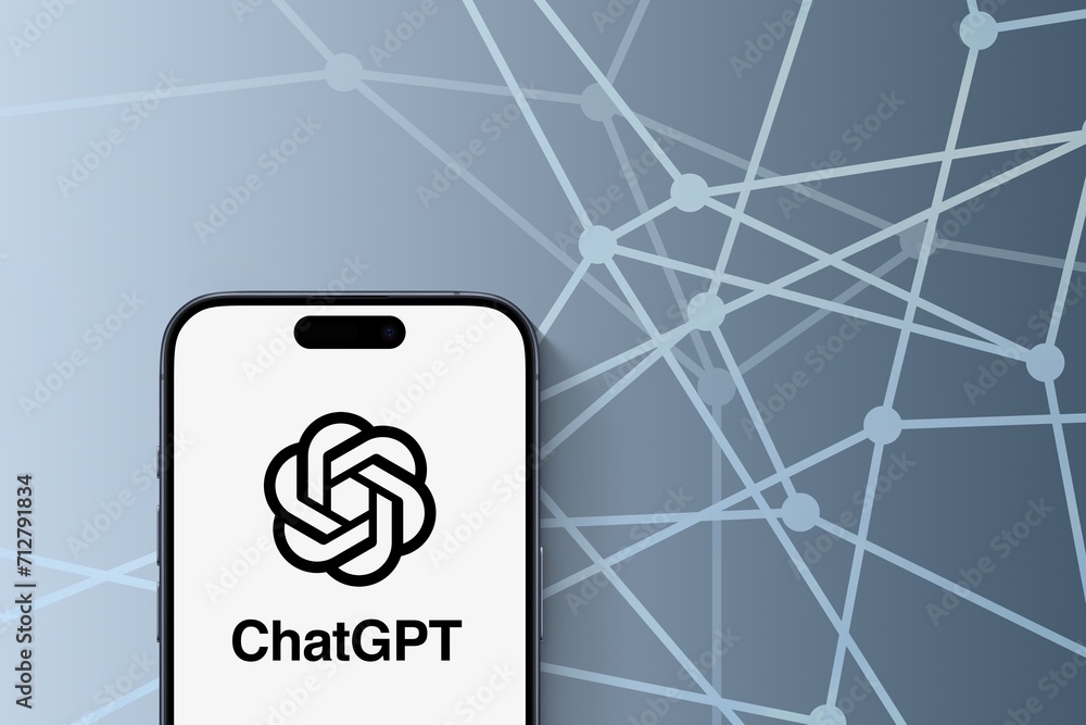 ChatGPT logo is displayed on modern smartphone, with connected dots and ...