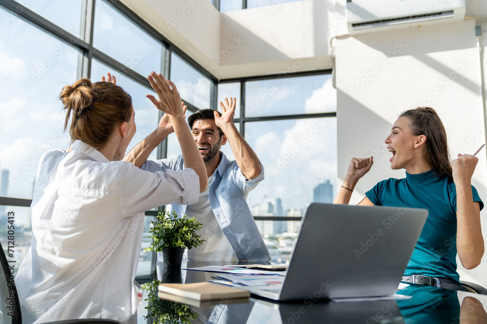 Group of happy businesspeople celebrate their successful project ...