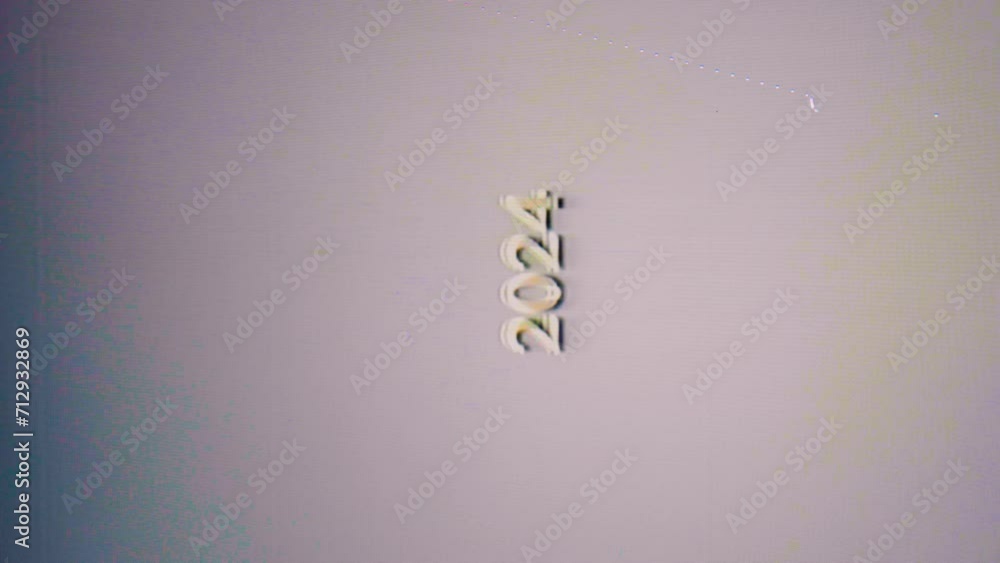 Vertical 2024 numbers glitch with white grain dust streaks passing over ...