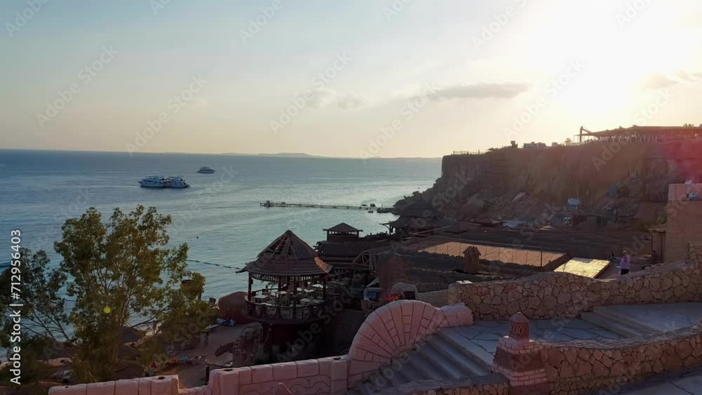 Sea harbor at sunset, Shark's Bay Beach, Ras Um Sid. View from the ...