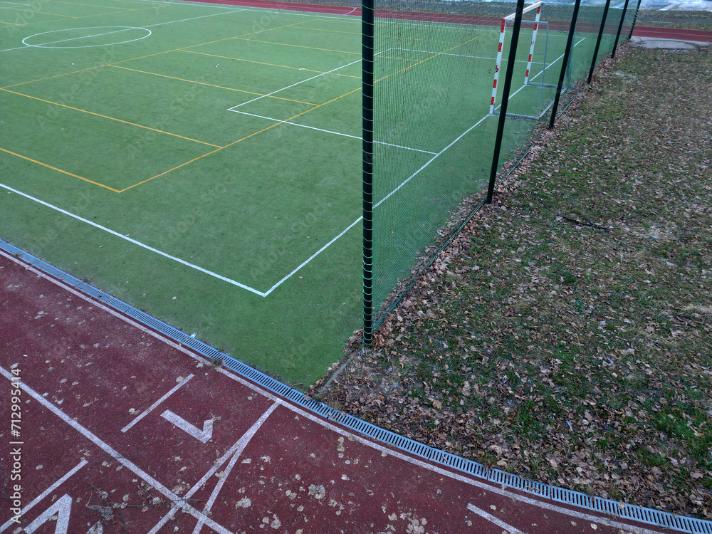 sports stadium with a running track with several lanes. inside oval ...