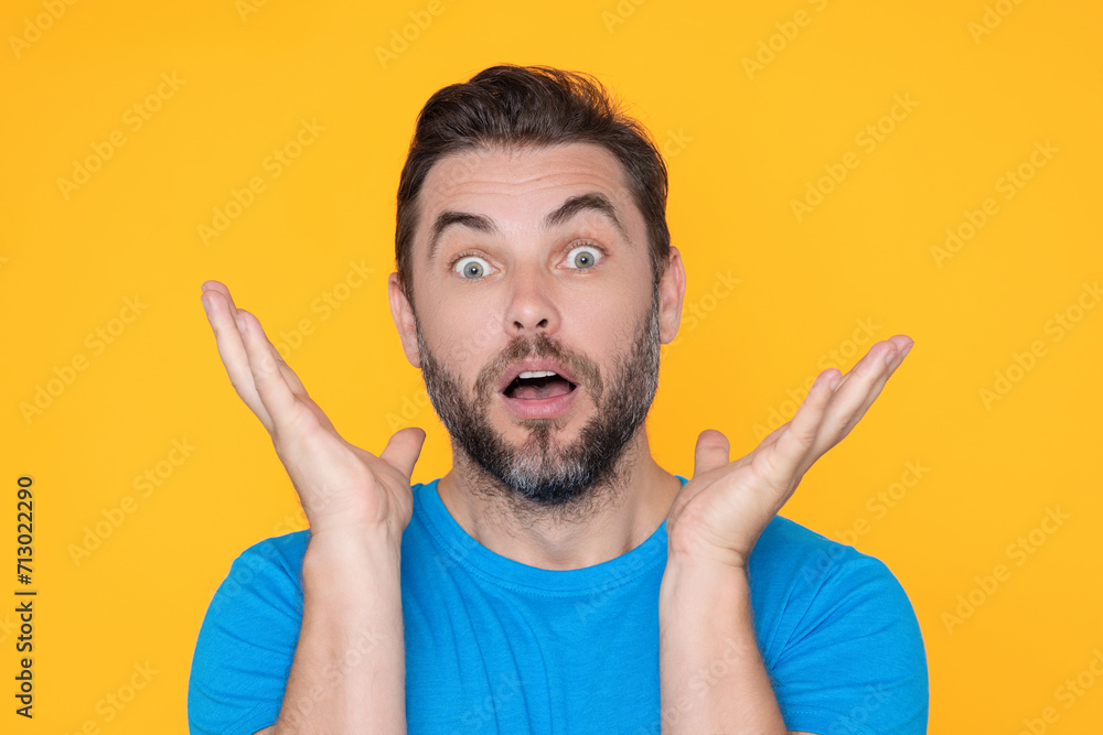 Emotional scared man looks with frightened expression, nervously ...