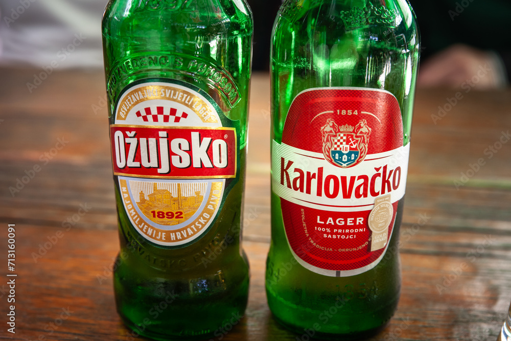 OSIJEK, CROATIA - SEPTEMBER 23, 2023: Bottles of Karlovacko Pivo ...