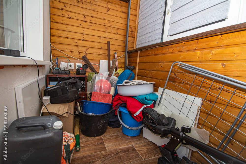 trash and disorder of unnecessary things from the storage area in a ...