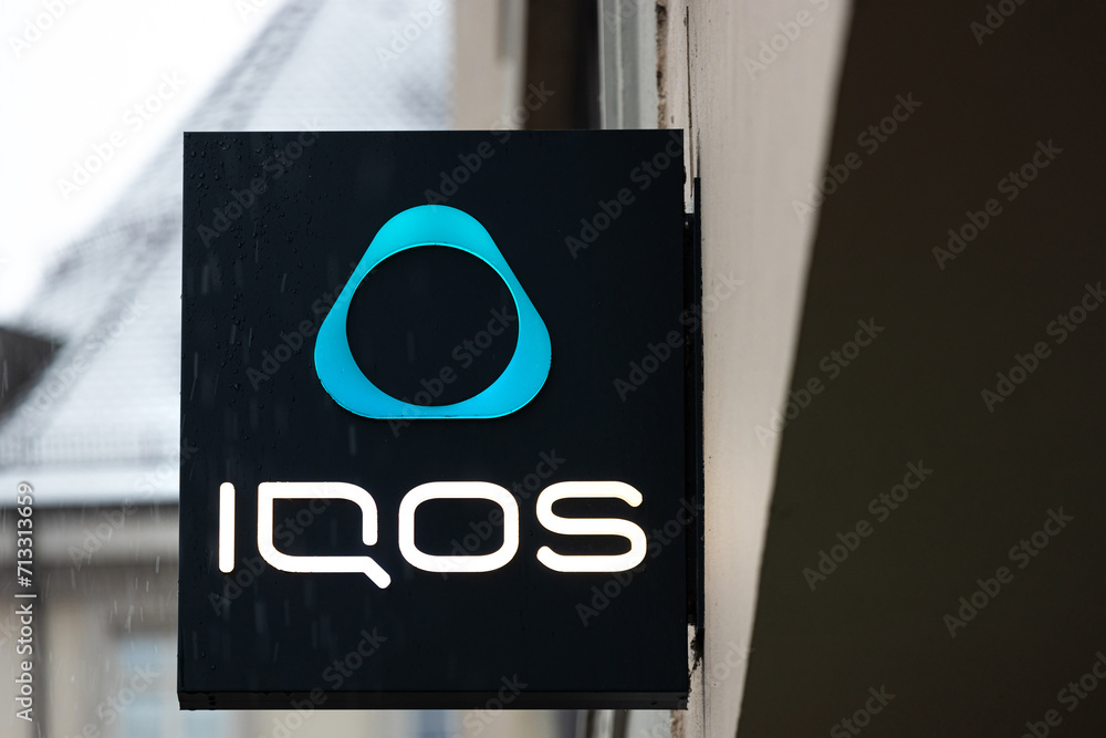 munich, bavaria, germany - 07 01 2024: a sign of iqos Photos | Adobe Stock